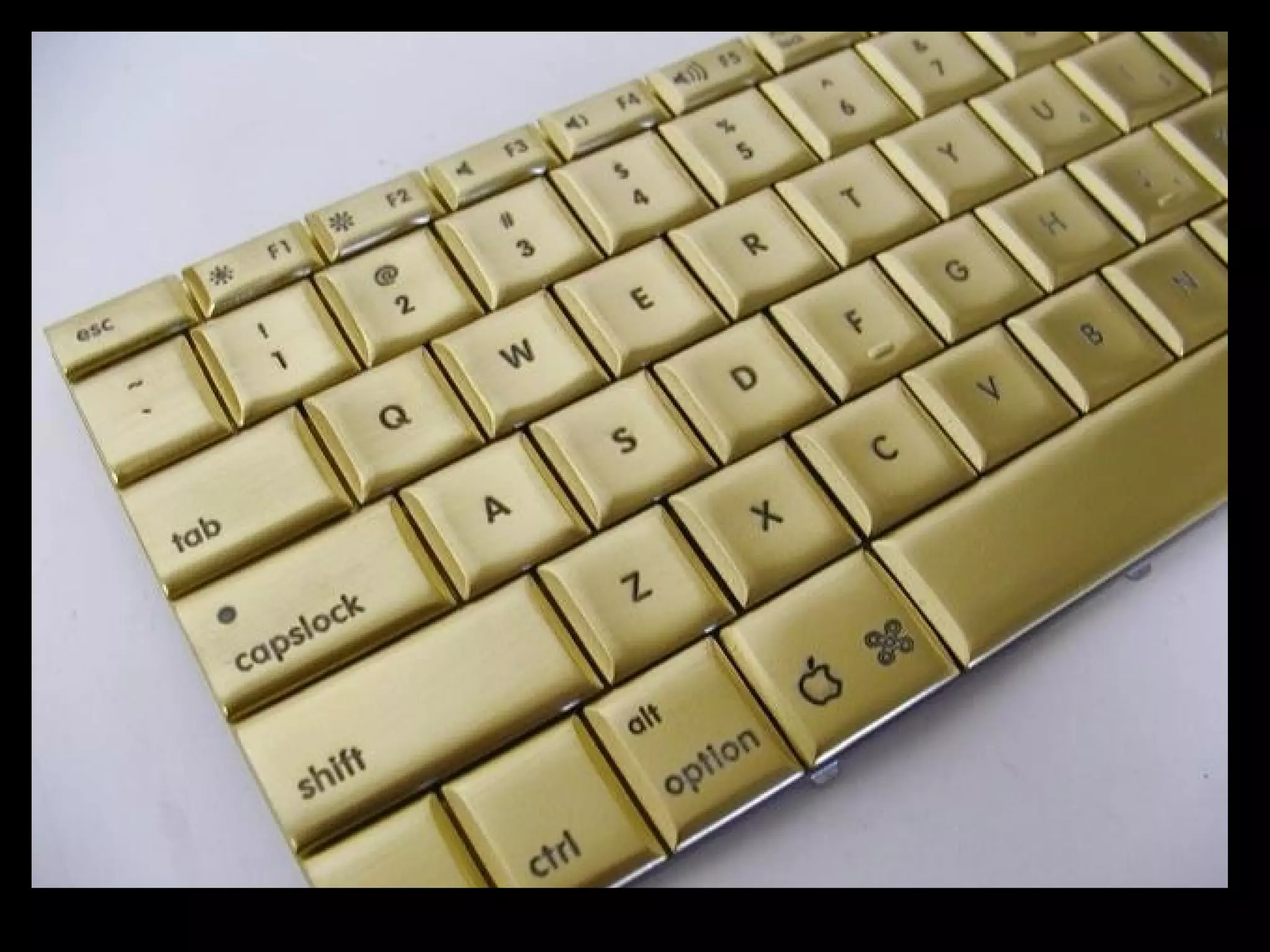 24K Gold Plated MacBook Pro with Diamond Studded Logo | PPT