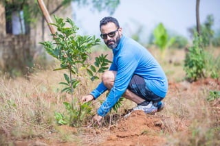 Anthony Locke tending to the garden | PDF