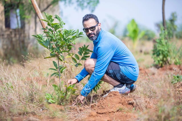 Anthony Locke tending to the garden | PDF