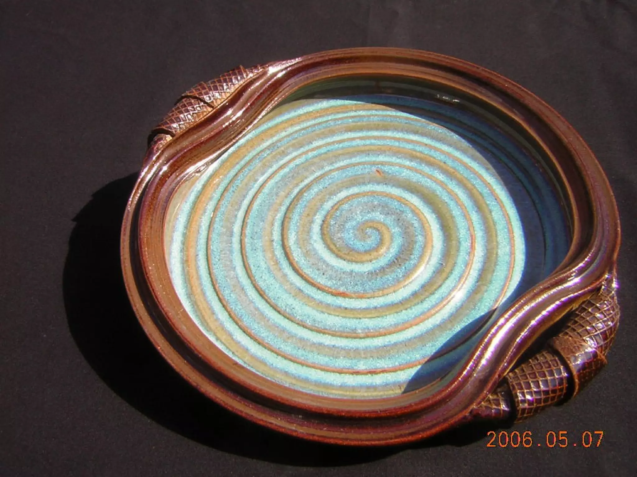 Examples of domestic ceramics and pottery, including sculptures made by ...