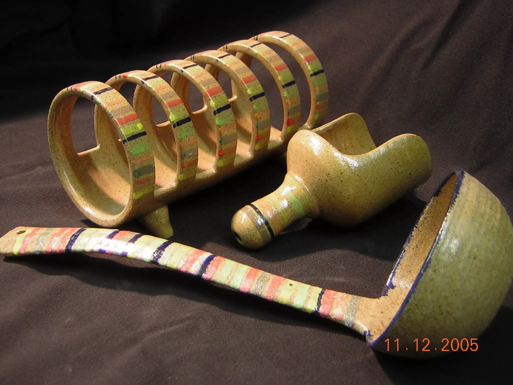 Examples of domestic ceramics and pottery, including sculptures made by ...