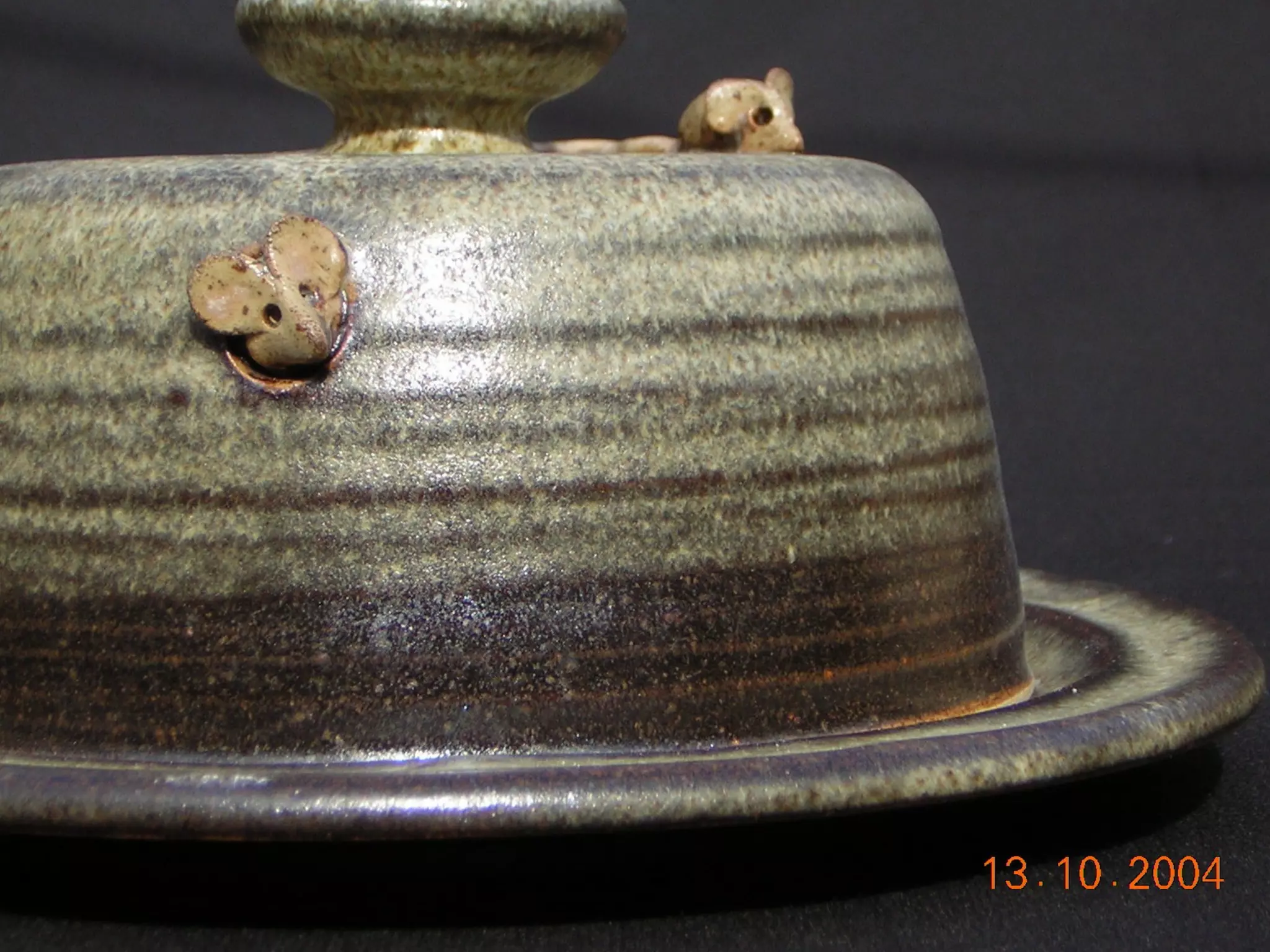 Examples of domestic ceramics and pottery, including sculptures made by ...
