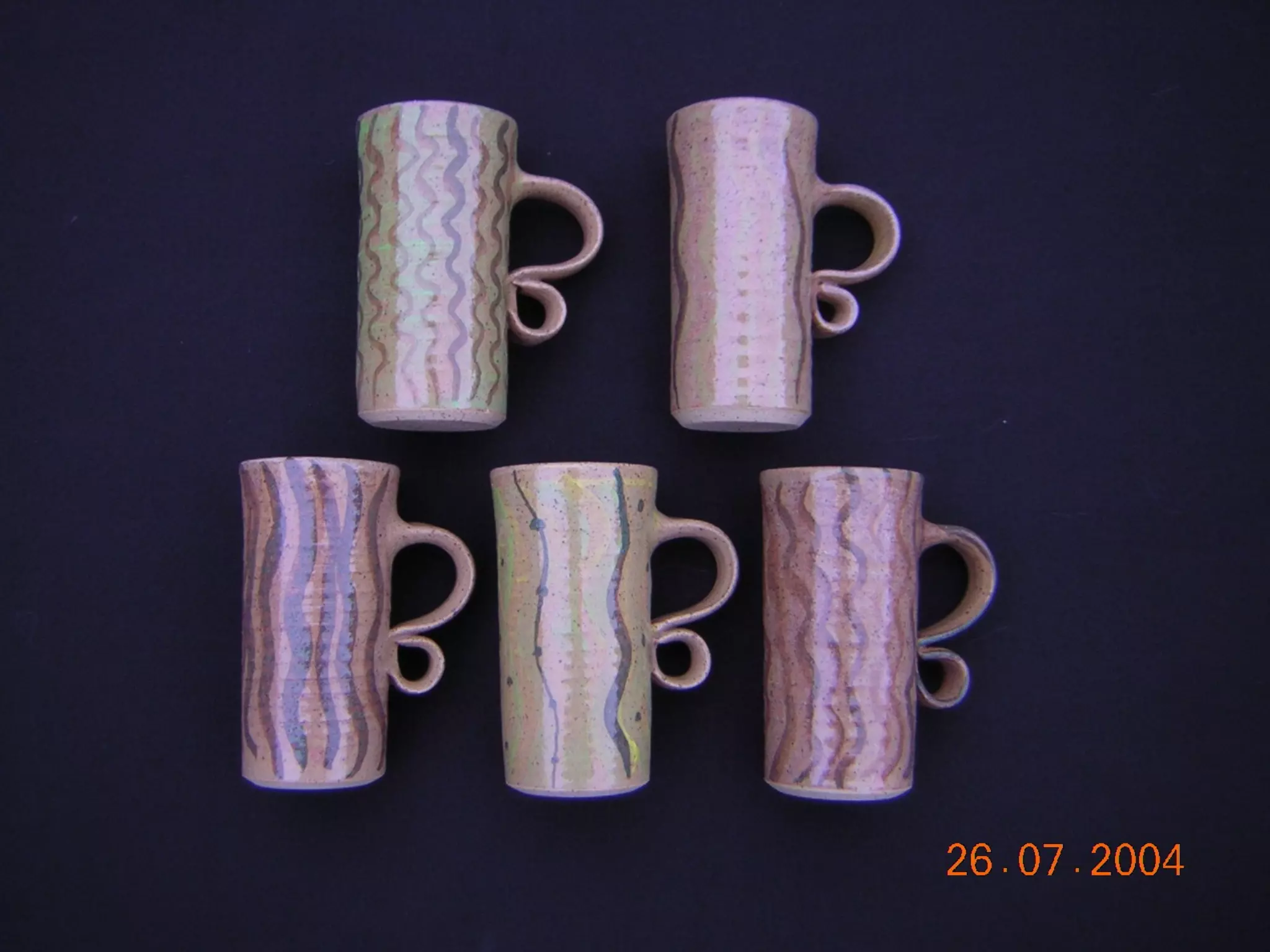 Examples of domestic ceramics and pottery, including sculptures made by Neil Johnson | PPT