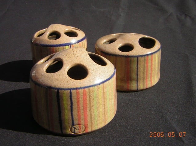 Examples of domestic ceramics and pottery, including sculptures made by ...