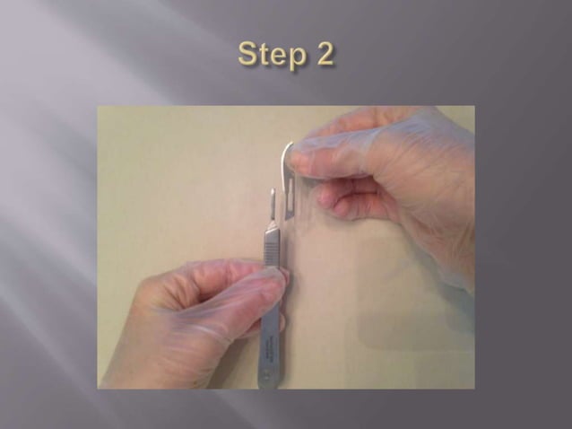 Loading a dermaplaning blade to a handle | PPT