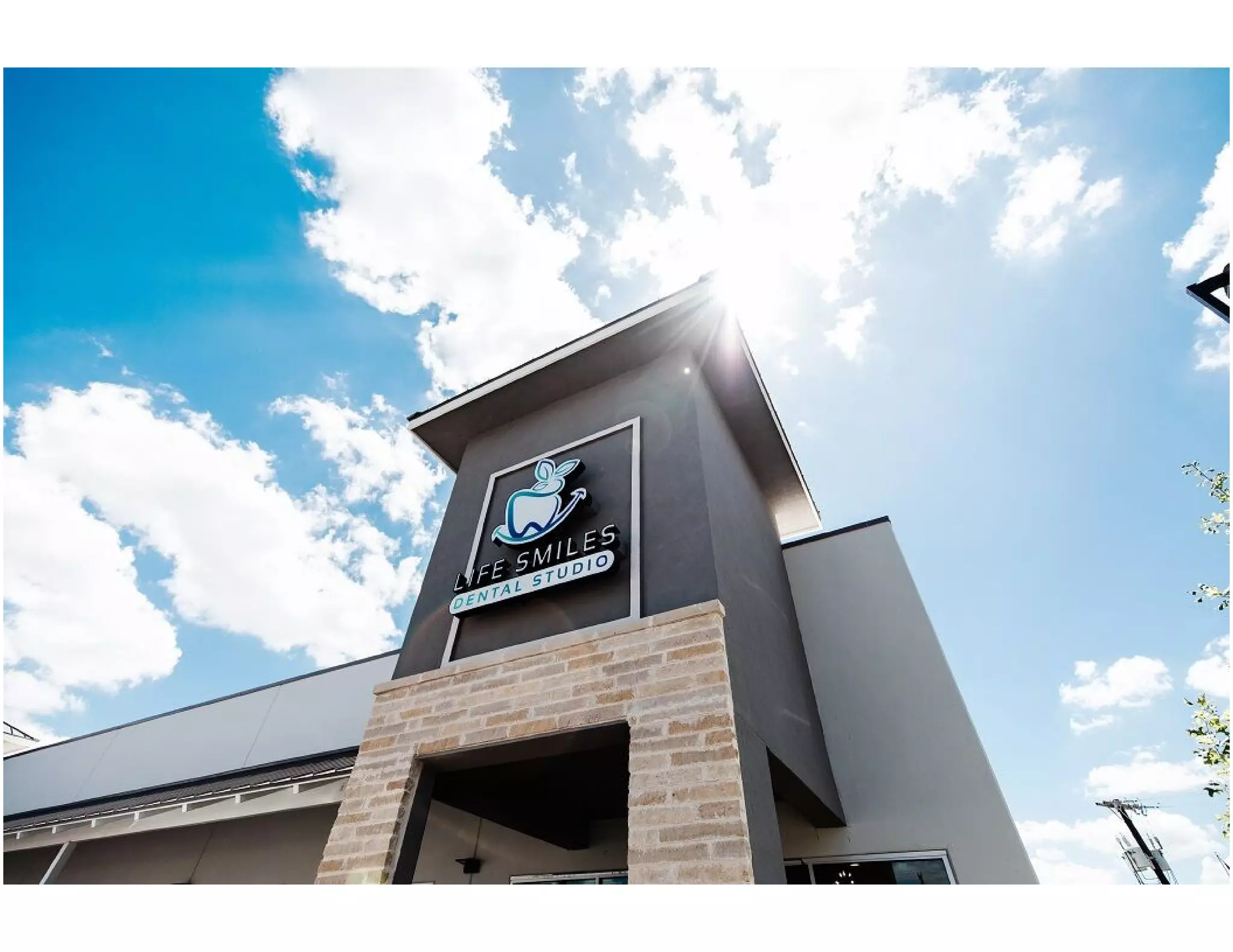 Outdoor signage at San Antonio dentist Life Smiles Dental Studio.pdf