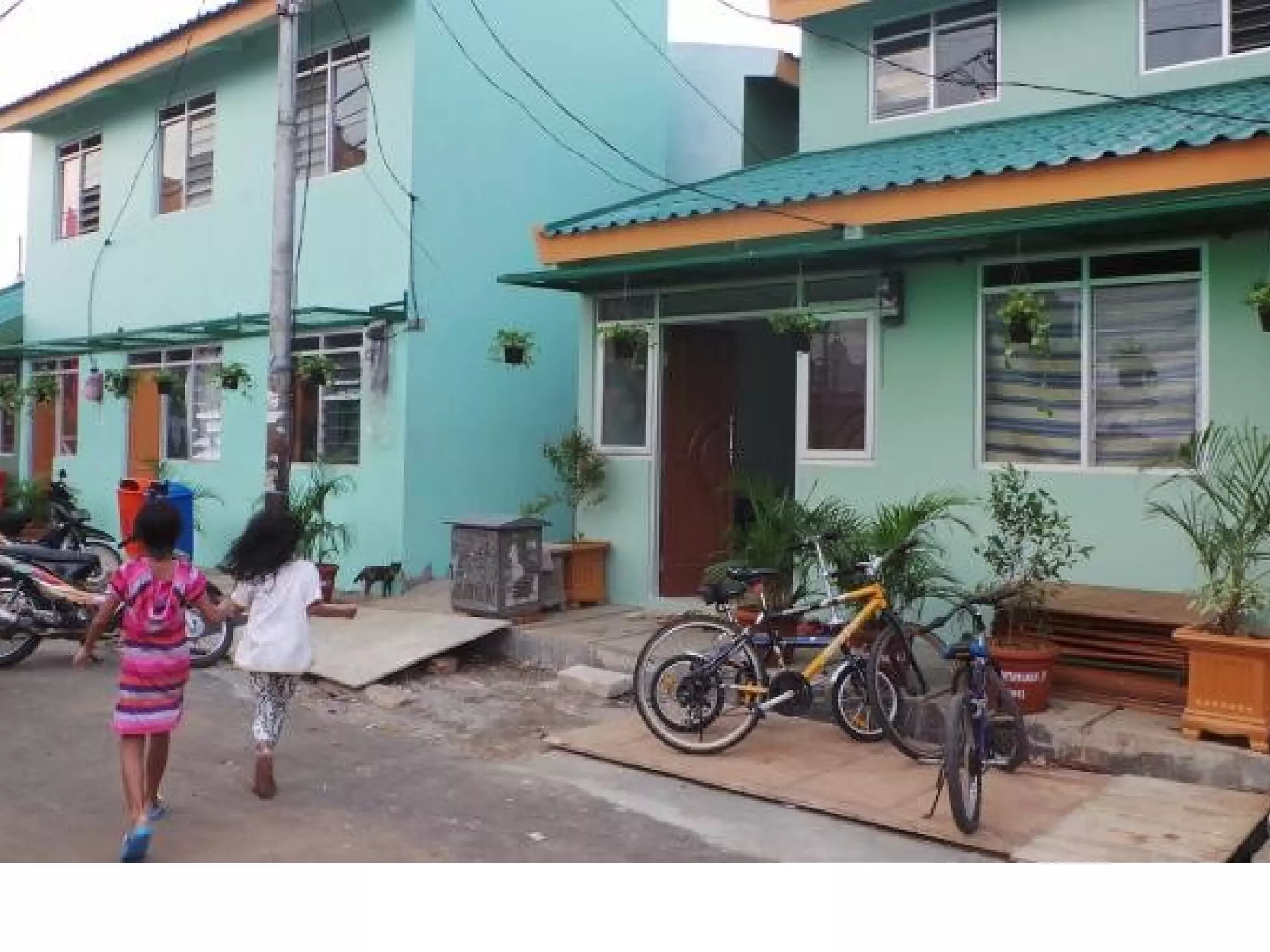 Pembangunan kampung deret vertikal | PPT