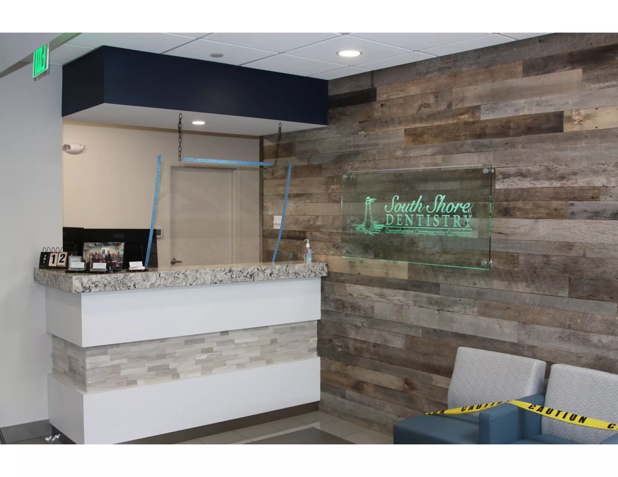 Plexiglass installed at the reception area at Weymouth dentist South ...