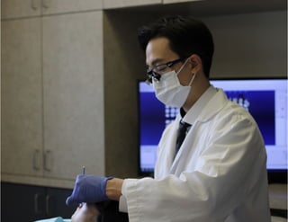 Seattle dentist Dr. Harry Shin performing root canal at Moritis Shin ...