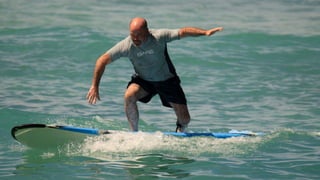 Surfing Lessons at Big Wave Dave | PPT