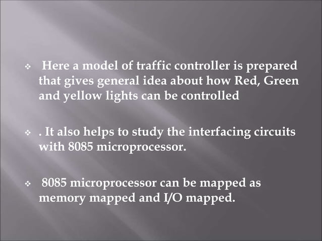 TRAFFIC CONTROLLER USING 8085.ppt | Computing | Technology & Computing
