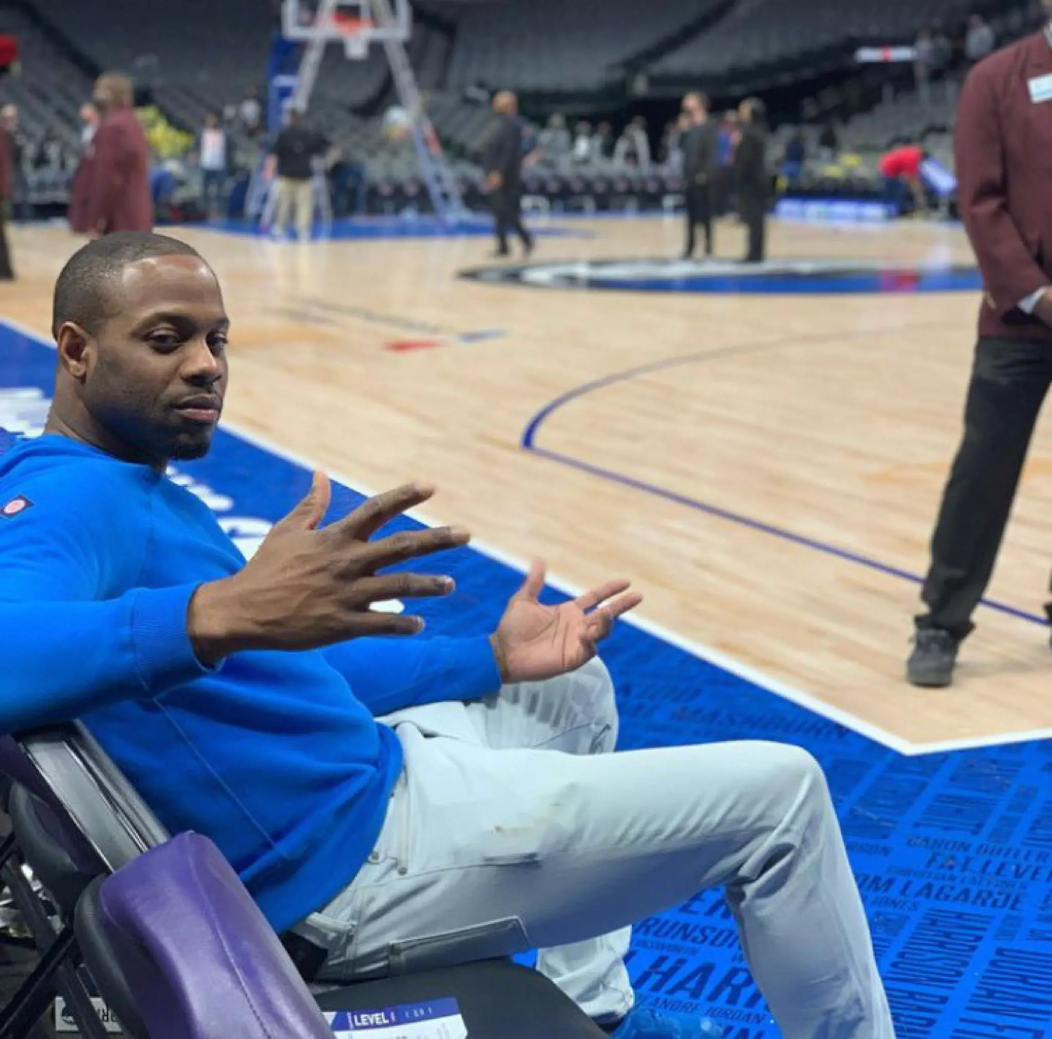 William Lefear sitting courtside at the Dallas Mavericks Basketball ...